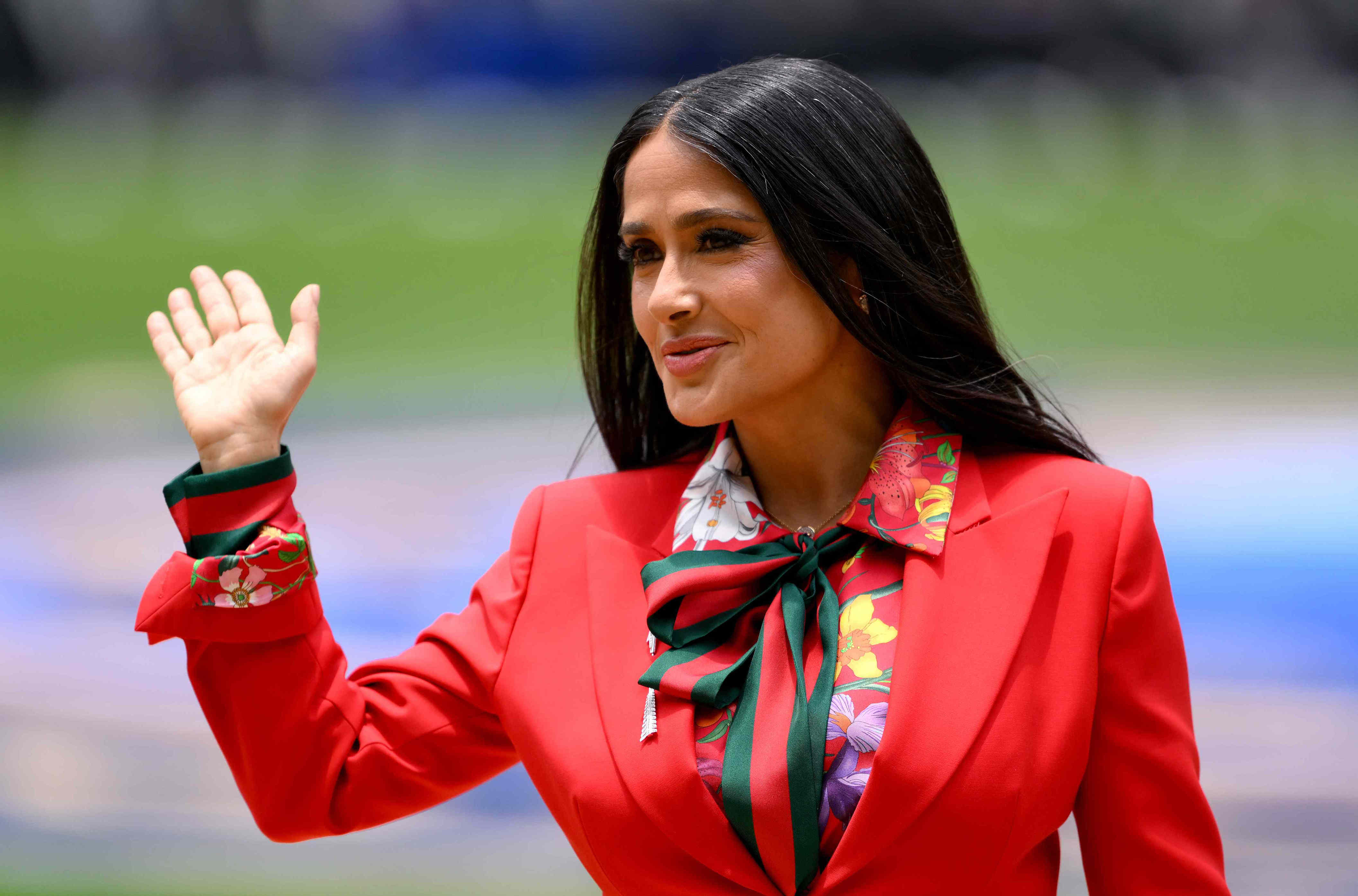 Salma Hayek wears red-hot power suit with potential hidden meaning at ...
