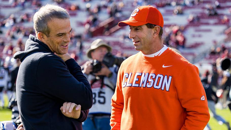 Which college football head coach on the hot seat is recruiting the best?