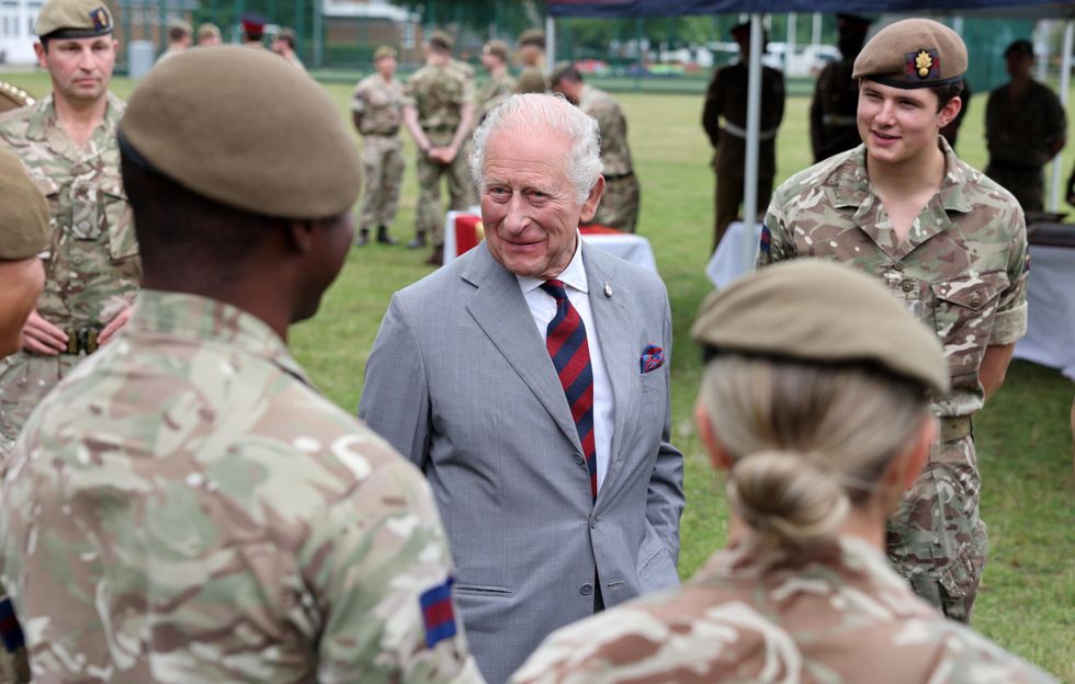 King Charles jokes as he meets Grenadier Guards ahead of Trooping the ...