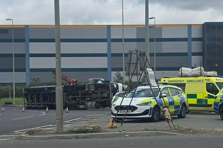 Emergency crews rush to Tilbury after lorry overturns