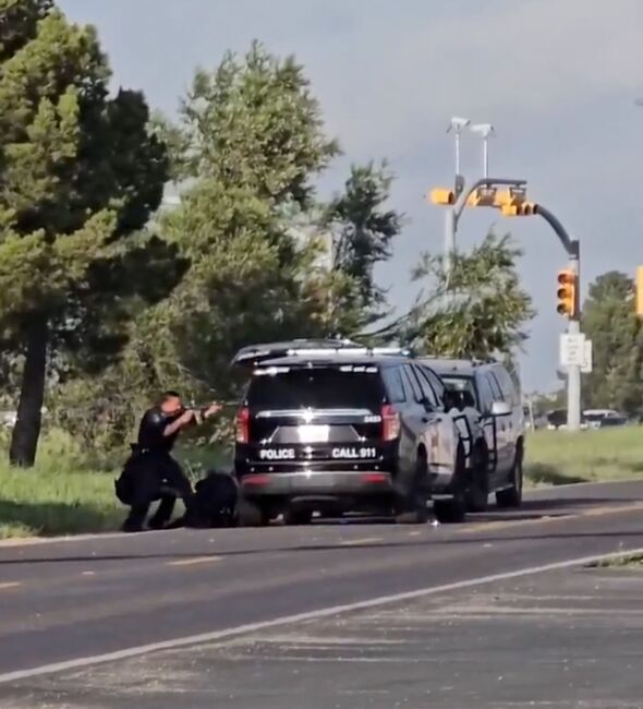 Texas mass shooting: Cop with assault rifle spotted firing at gunman in ...