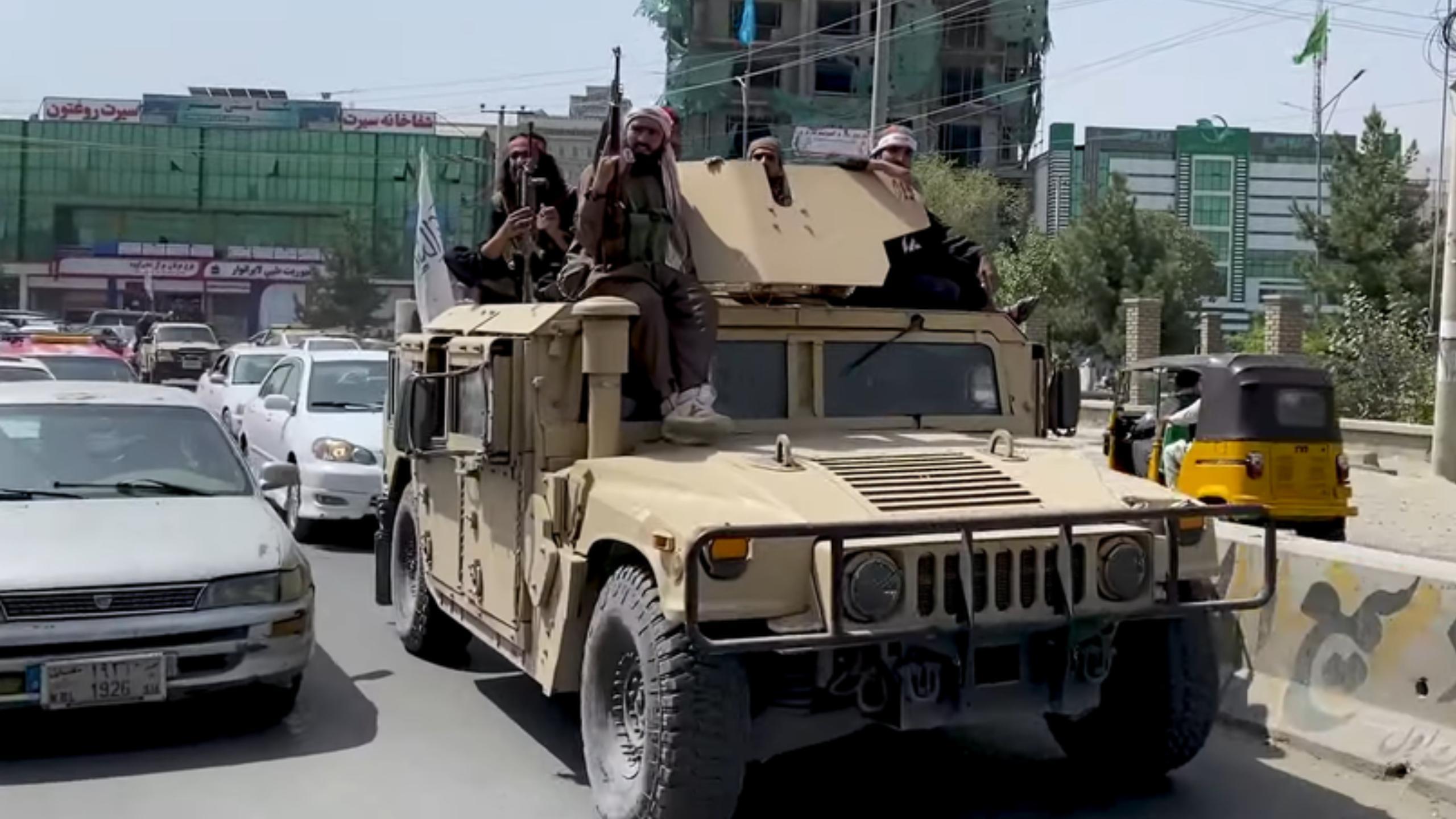 UN confirms child killed after Taliban open fire on rare women's rights ...