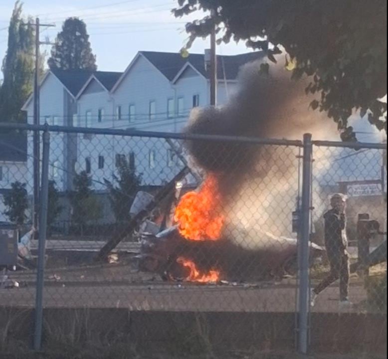 Driver hospitalized after crashing into power pole, car fire in Hazel Dell