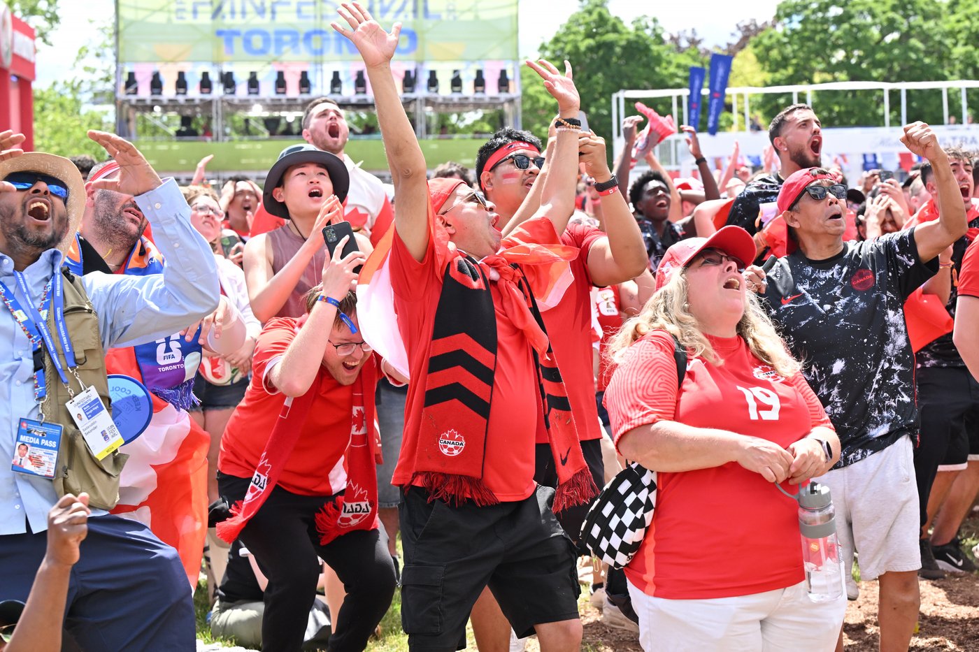 Away from Toronto stadium, fans gather to watch Canada's 'historic ...