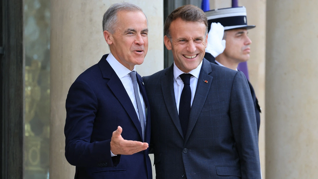 Carney and Macron sign defence and technology pact in Paris