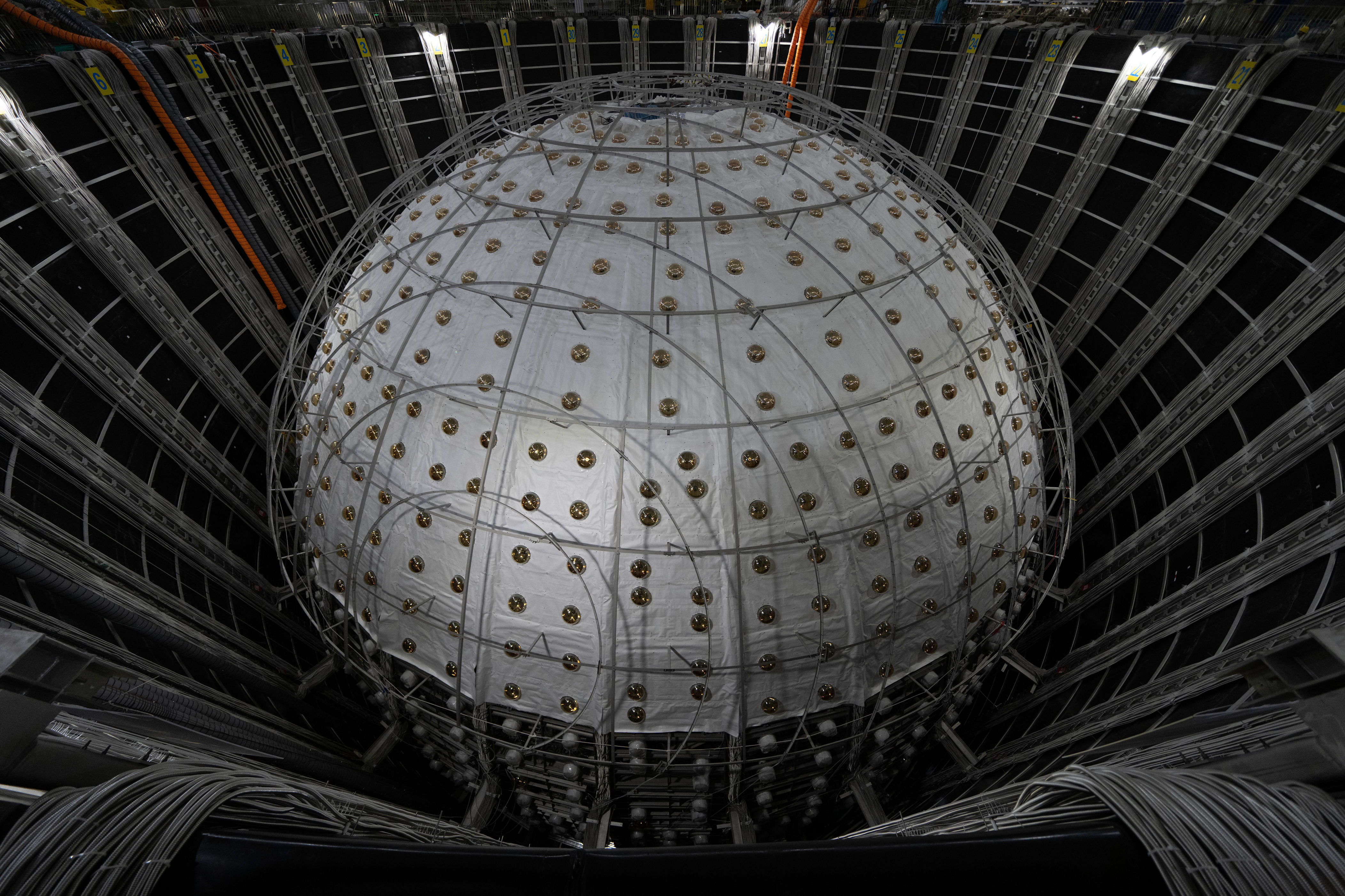 Massive underground detector aimed at understanding mysterious ghost ...