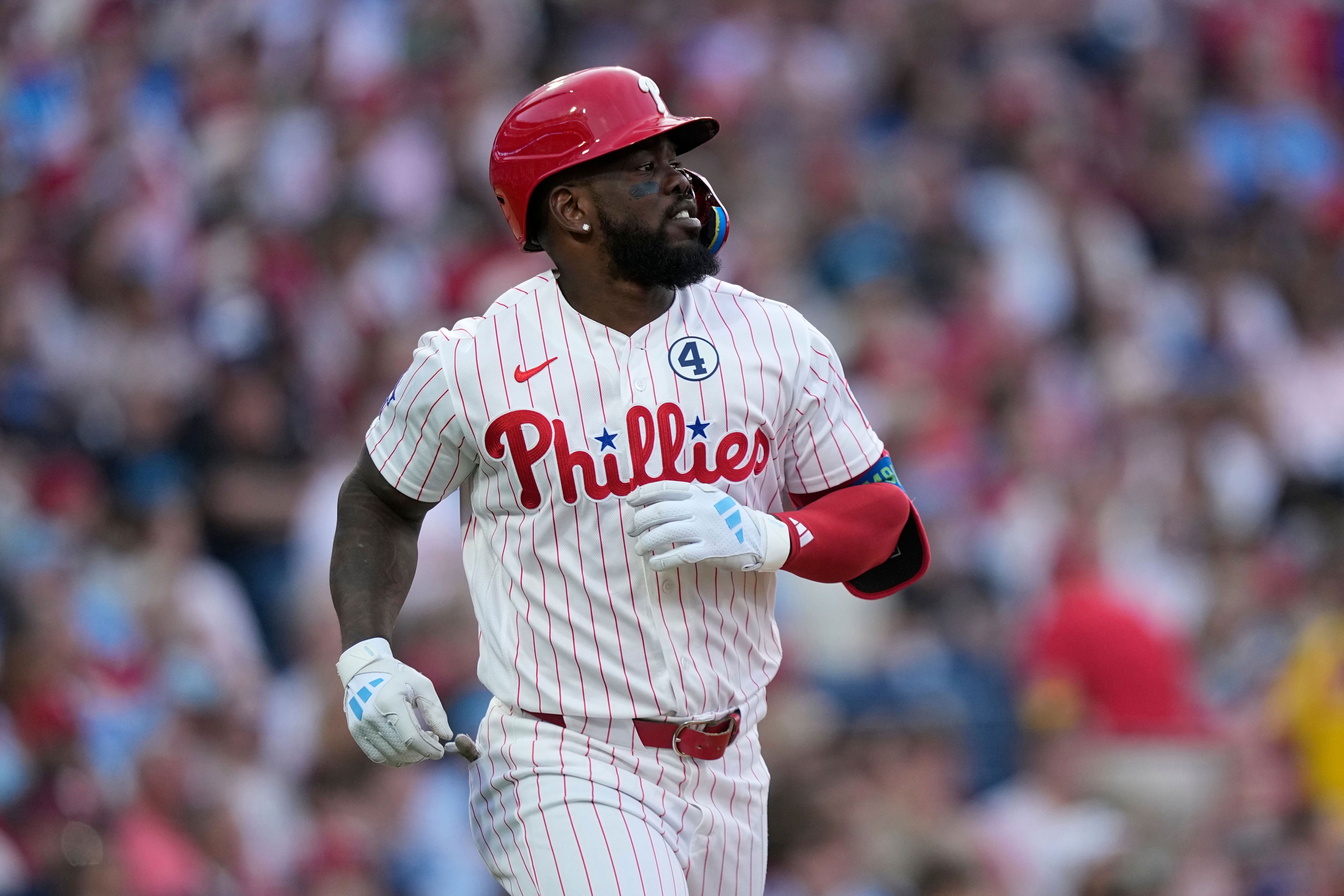 Phillies place RF Adolis García on 60-day IL with right lat tear, call ...