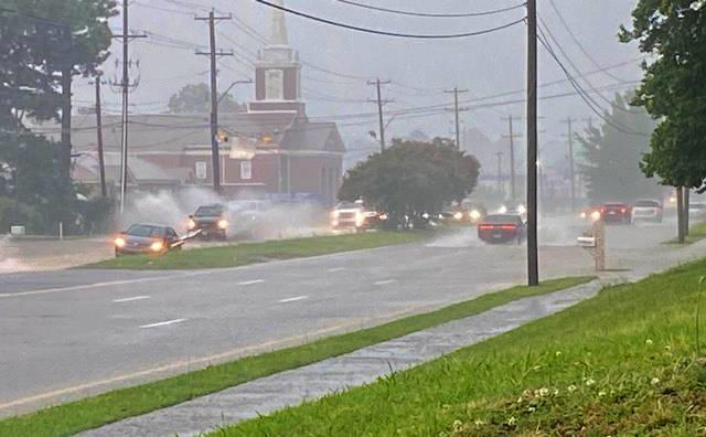Flash flooding leaves drivers stuck, trees fallen in streets