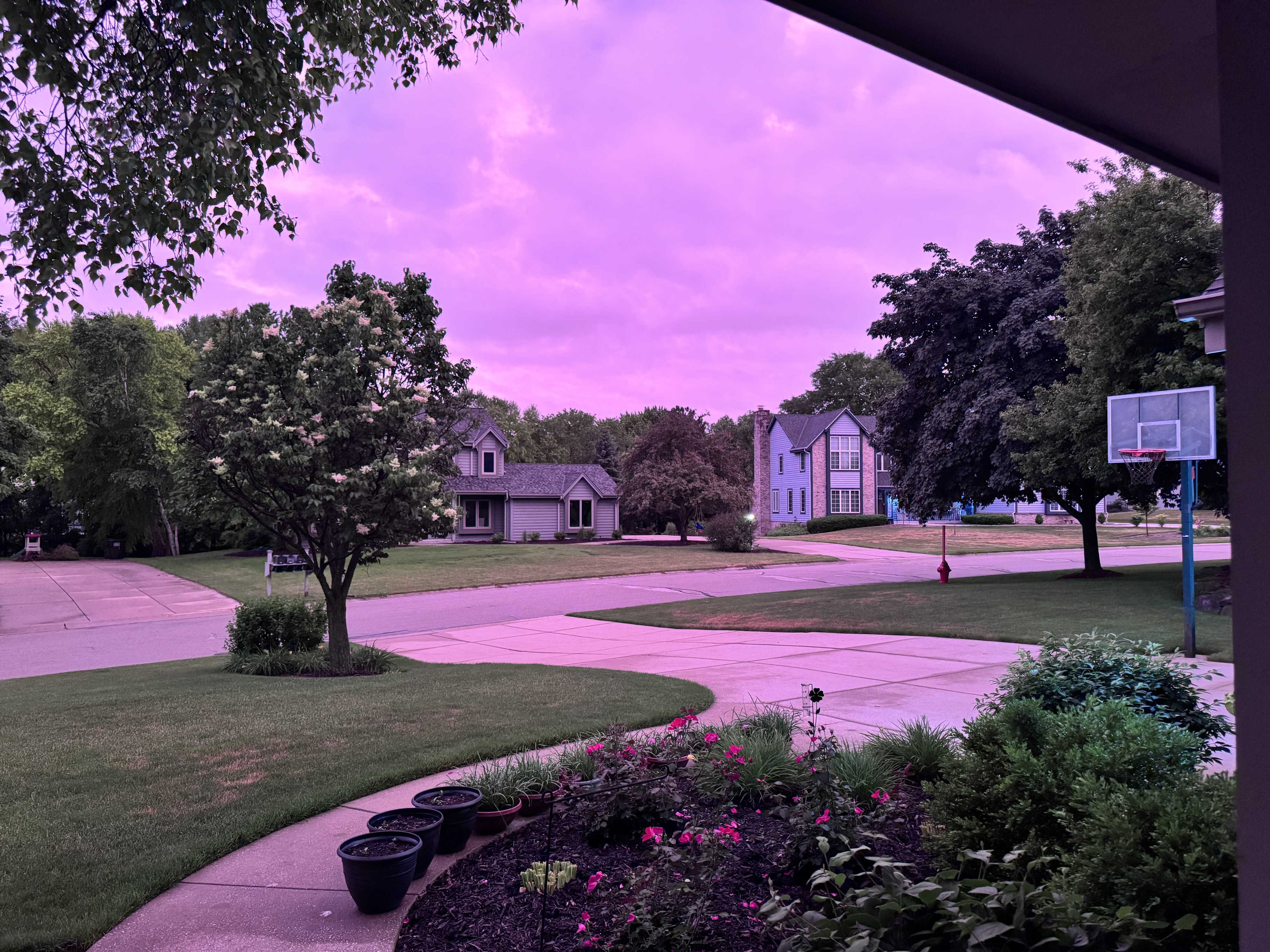 What caused the pink sky after storms passed southern Wisconsin?