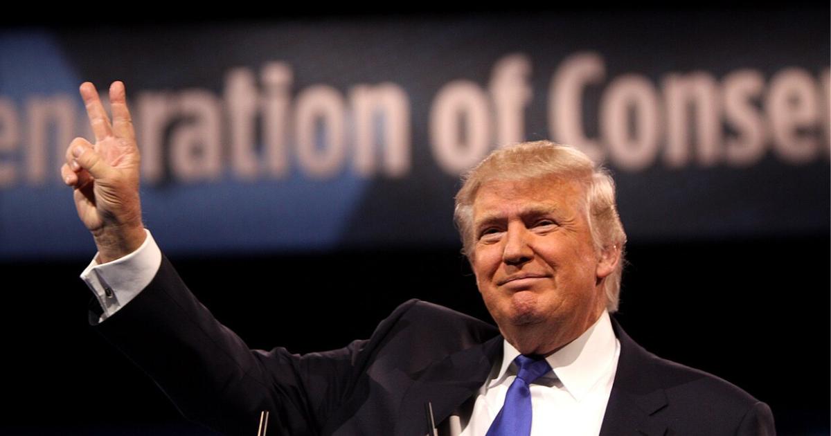Deleted mysterious Trump photo with red-clad group ignites speculation ...