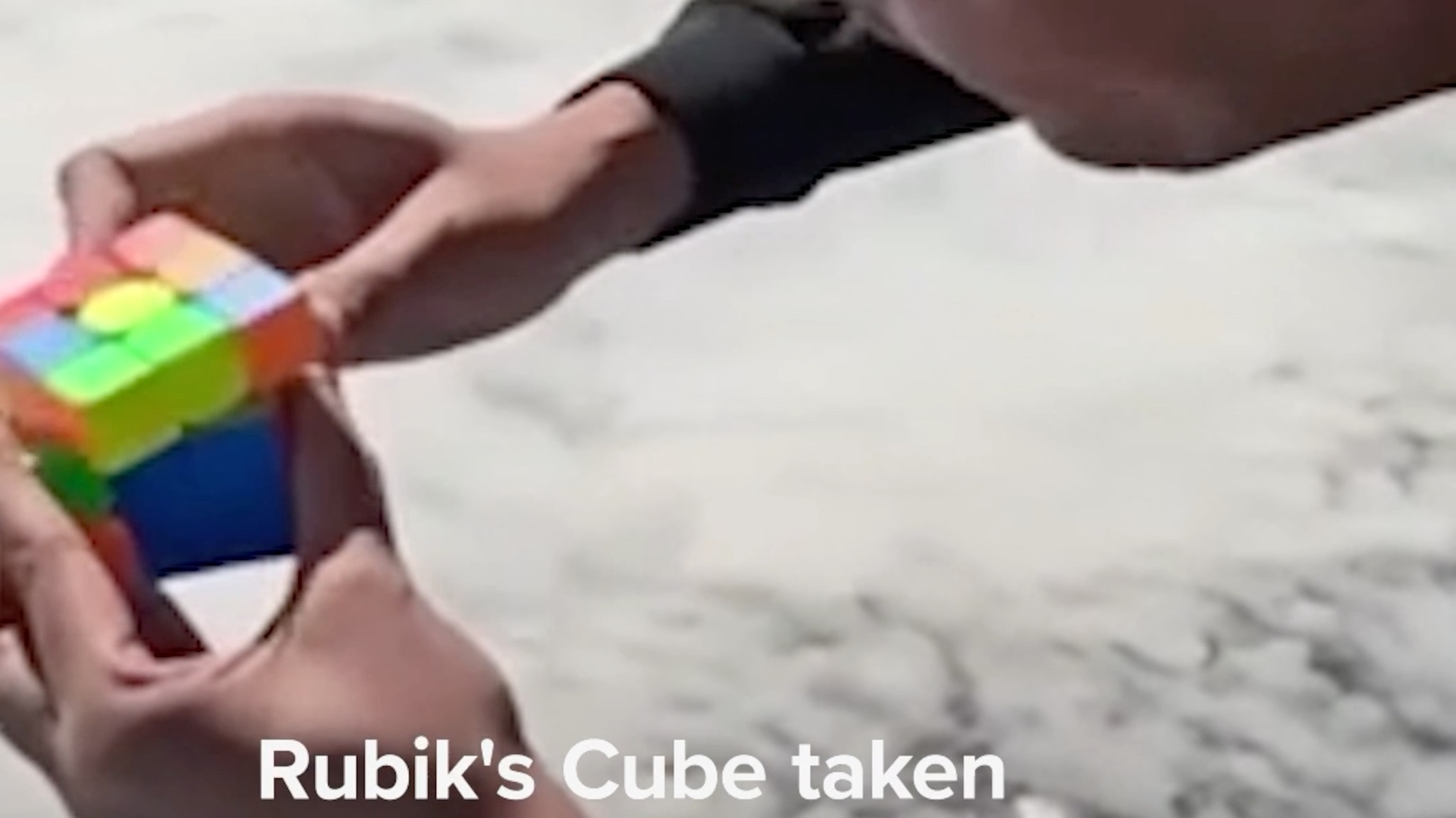 A man sets a world record by solving a Rubik’s Cube while skydiving
