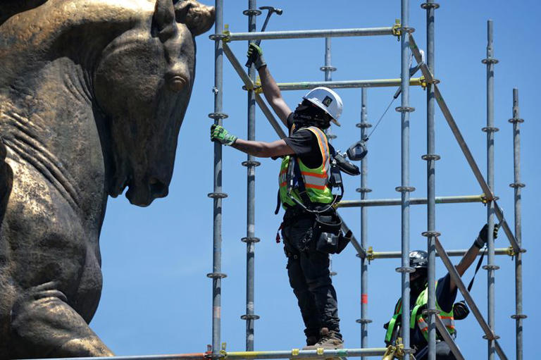 Trump covers DC statues in gold as outraged Americans struggle to ...