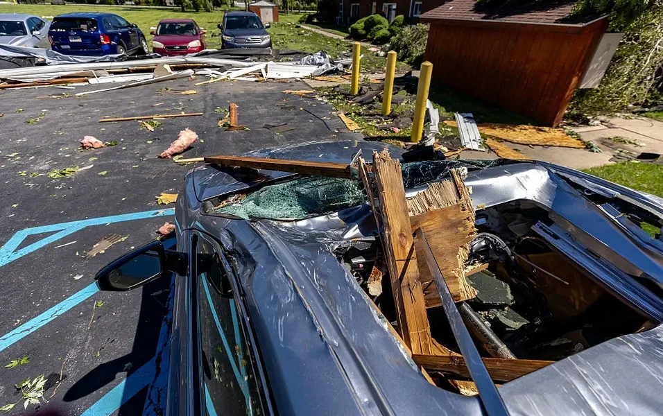 Tornadoes devastate Midwest as East Coast swelters in heatwave