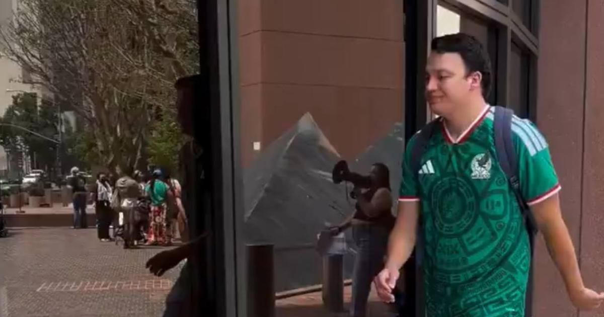 'Be ashamed': ICE agent confronted after leaving federal building in ...