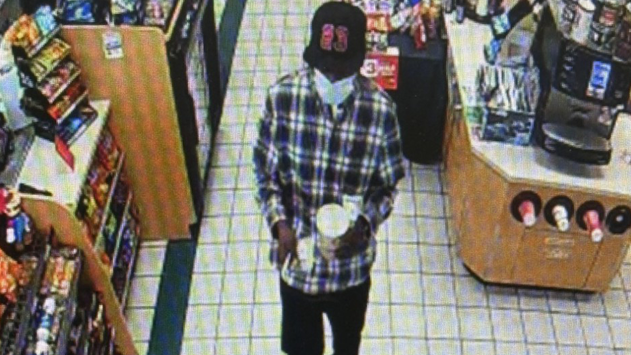 Police search for suspect in armed robbery at convenience store