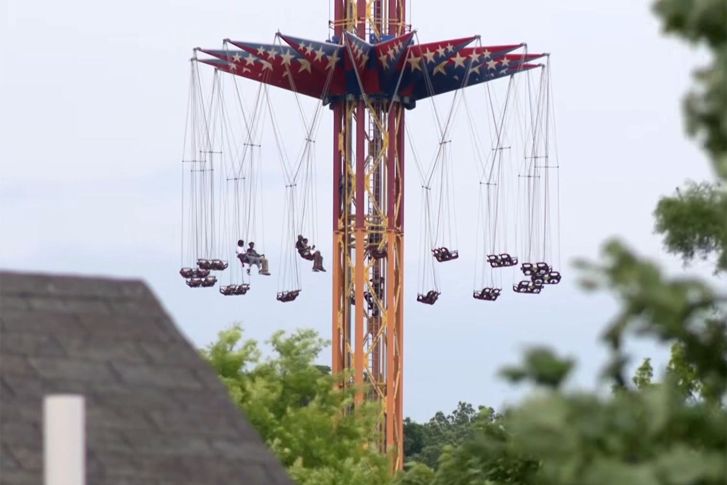 Family of 4 stranded 130 feet in the air on Six Flags ride as ...