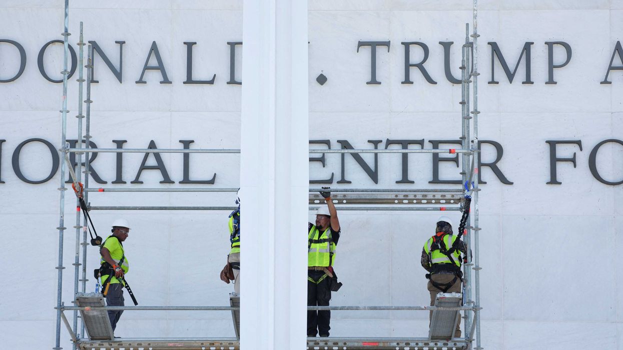 Workers remove Trump's name from Kennedy Center following court order