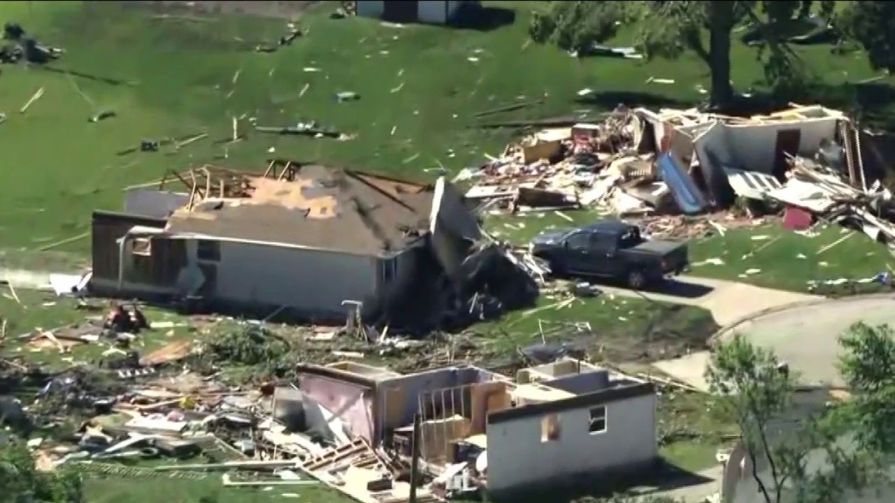 News photographer rescues man trapped under debris from Thursday’s storm