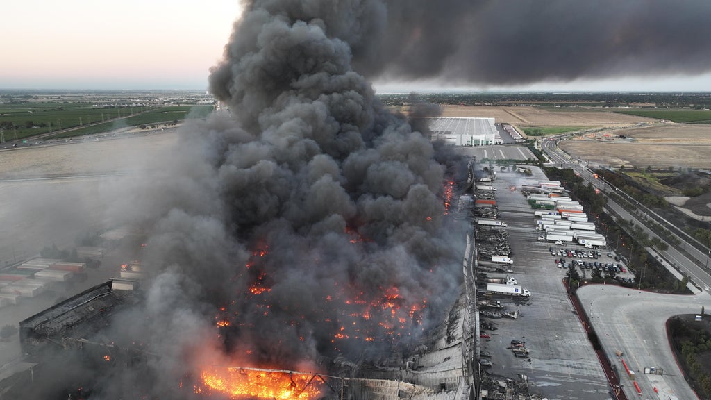 Tracy's air quality impacted by warehouse fire, residents urged to stay ...