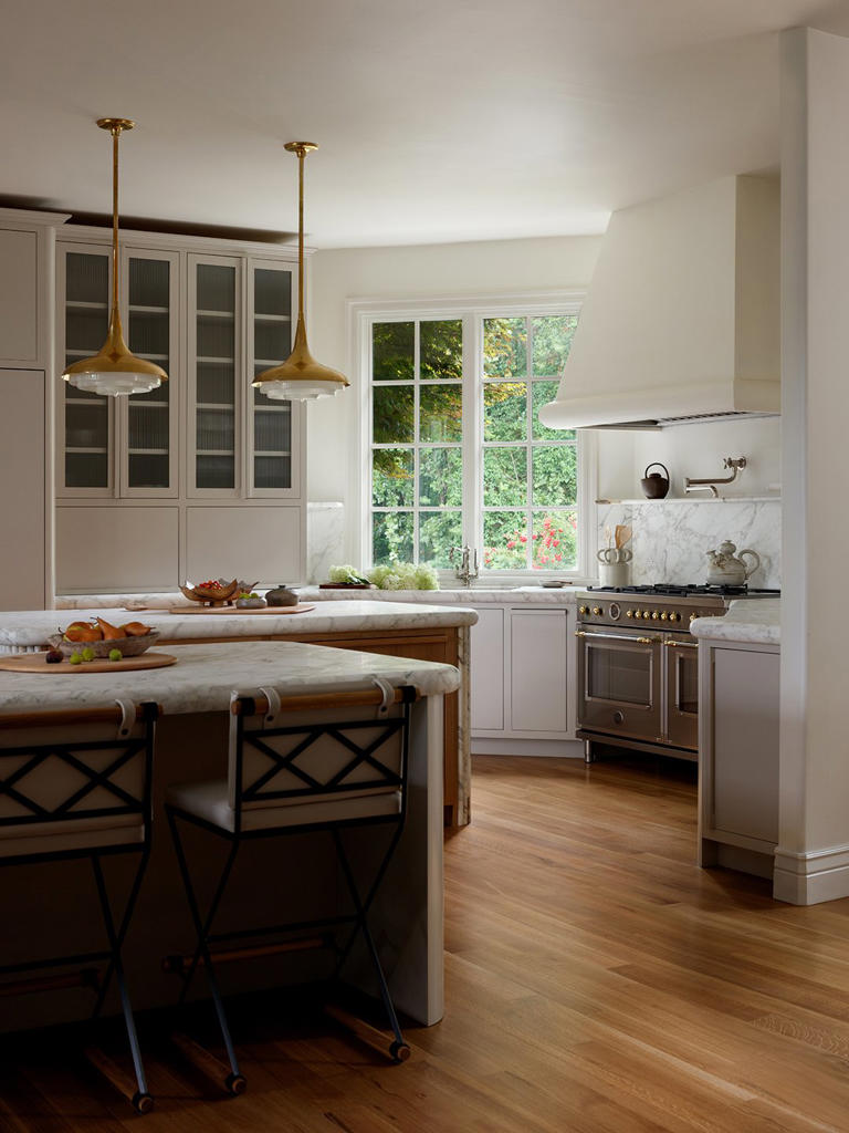 Before & after: Out with the faux Tuscan kitchen, in with the elegant ...