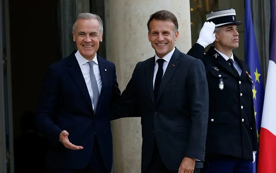 Carney and Macron sign defence and technology pact in Paris