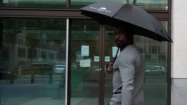 Footballer Michael Dome-Bemwin greets reporters outside court for £ ...