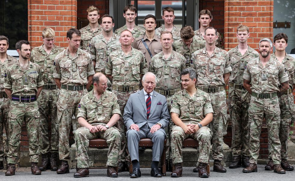 King Charles jokes as he meets Grenadier Guards ahead of Trooping the ...