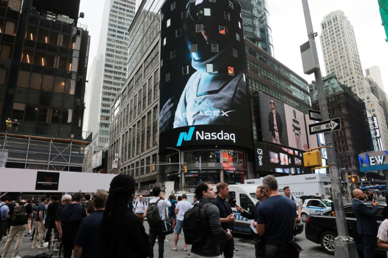 Wall Street climbs as SpaceX shares launch, oil slides on Mideast deal ...