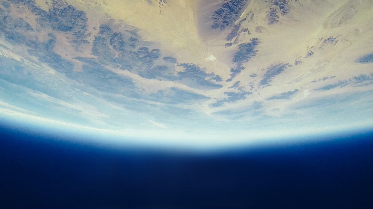 Earth’s atmosphere has no sharp edge; it simply fades into space