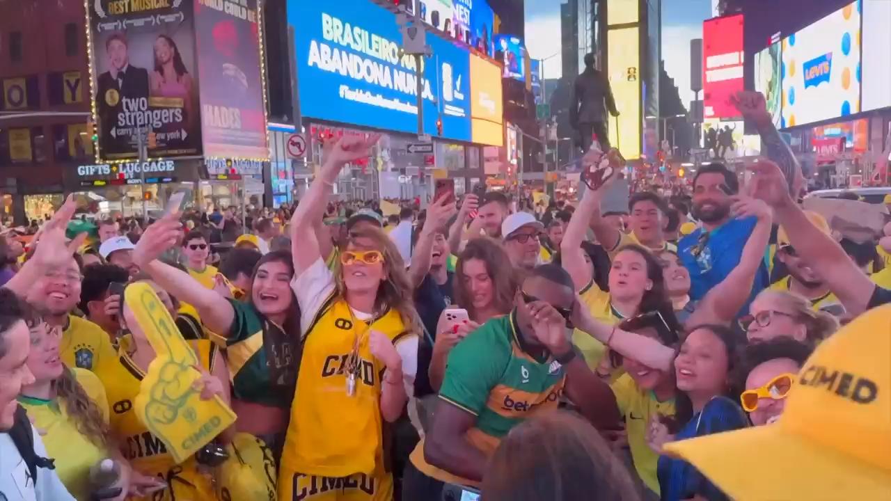Brazil fans take over Times Square in New York City ahead of World Cup ...
