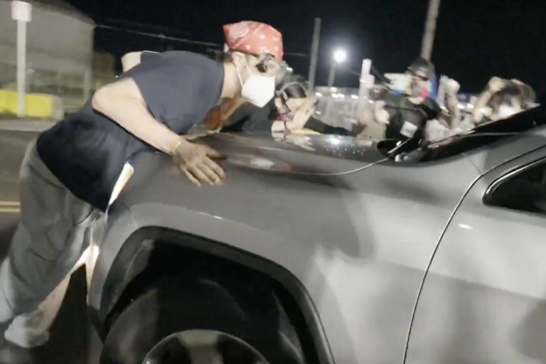 Car plows through ICE protestors who scream and kick vehicle leaving ...
