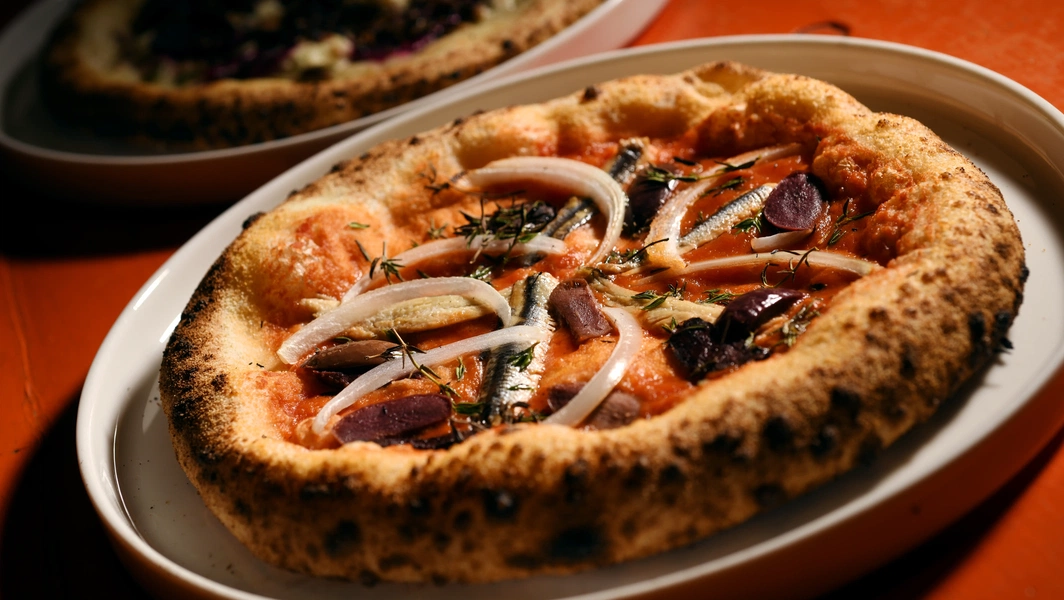 Unconventional pizza toppings and their unique flavors