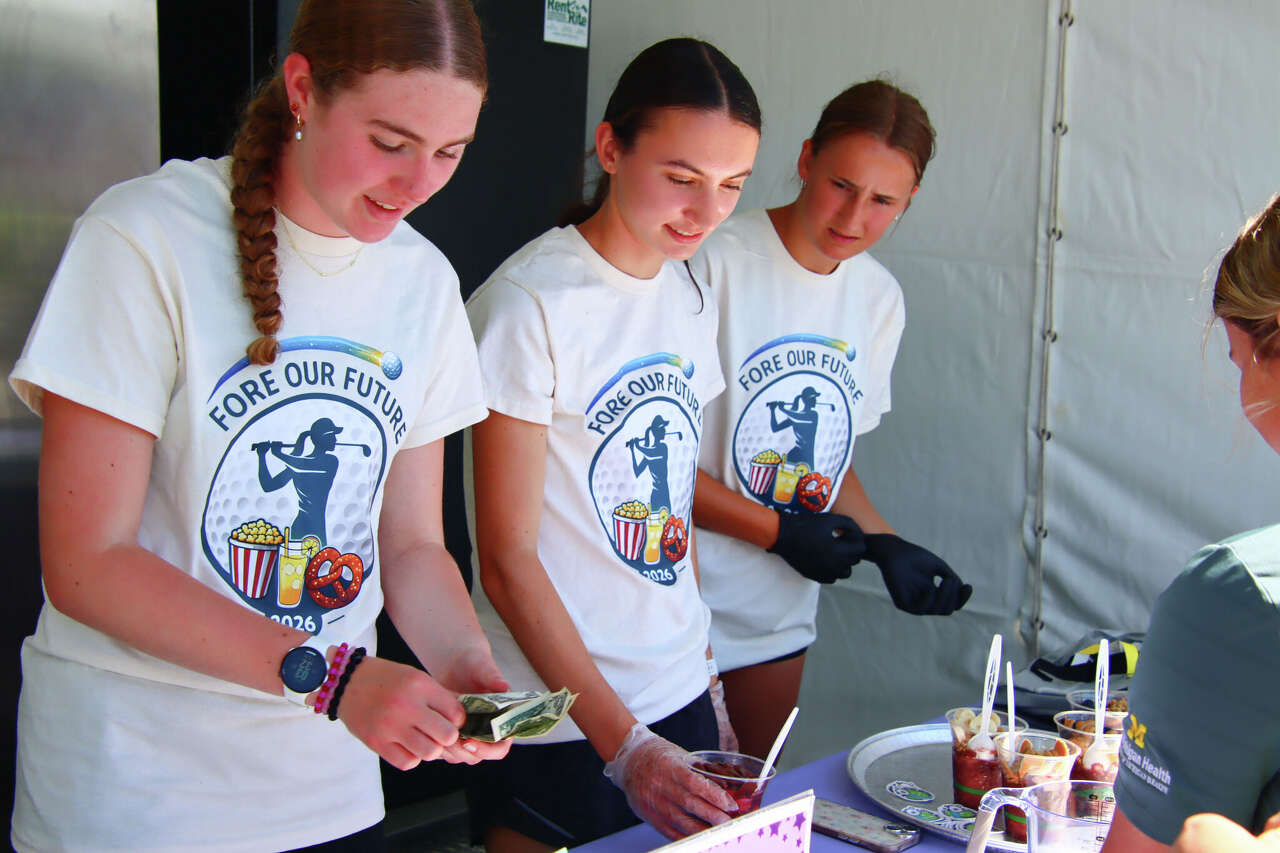 Young entrepreneurs sell food creations at Dow Championship through ...