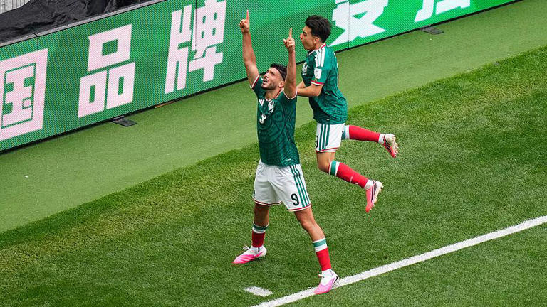Why do soccer players wear pink shoes at the World Cup?