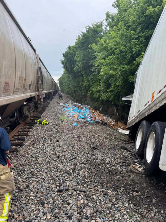 Semi stuck on railroad tracks hit by train in Chapel Hill