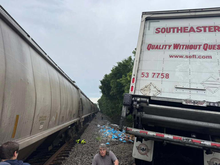 Semi stuck on railroad tracks hit by train in Chapel Hill