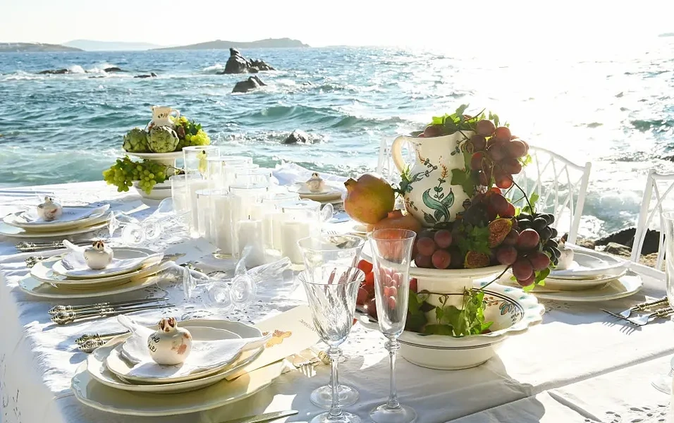 Summer table trends mix vibrant colour with coastal elegance