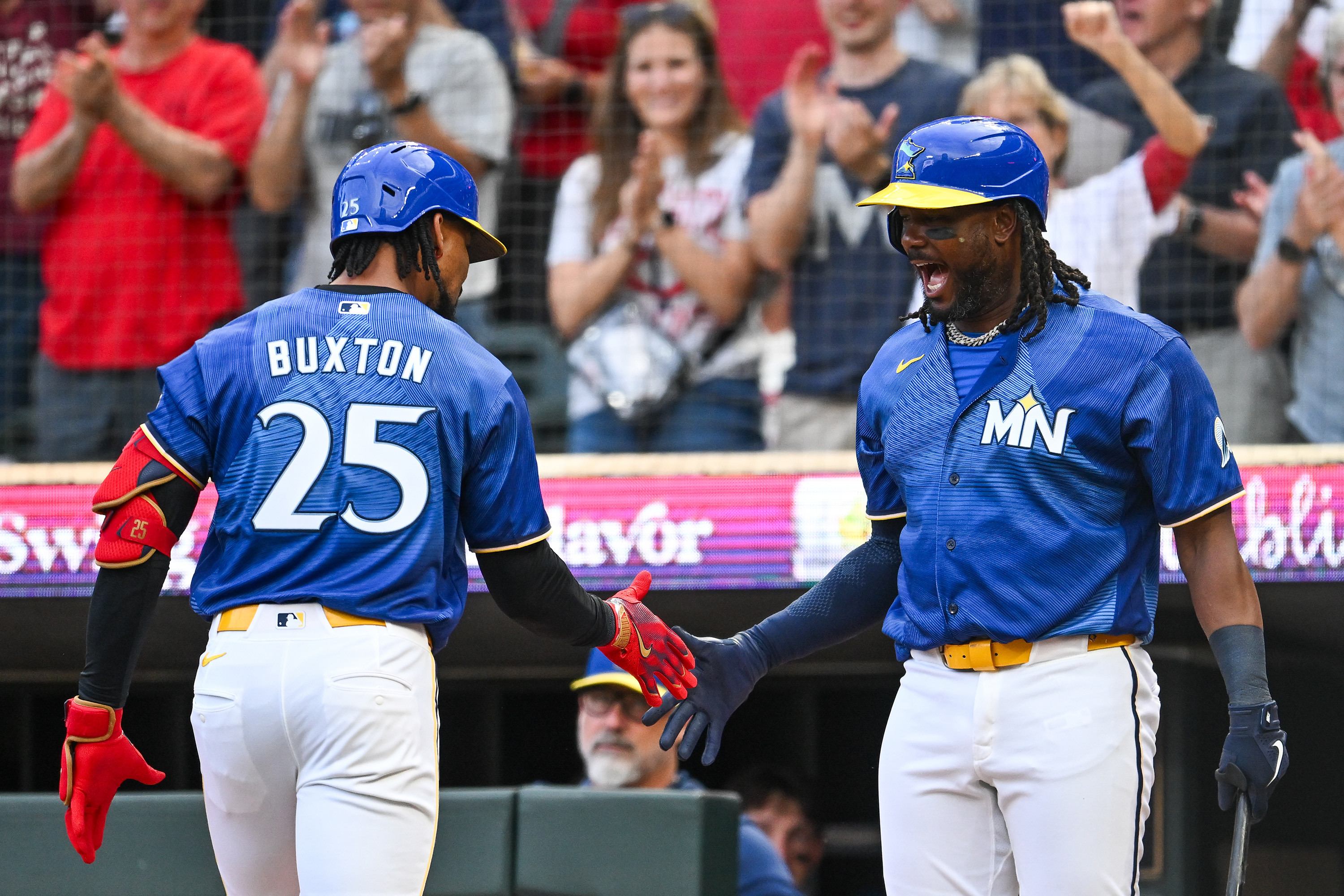 Twins hit three late home runs to rally past Cardinals, 9-8