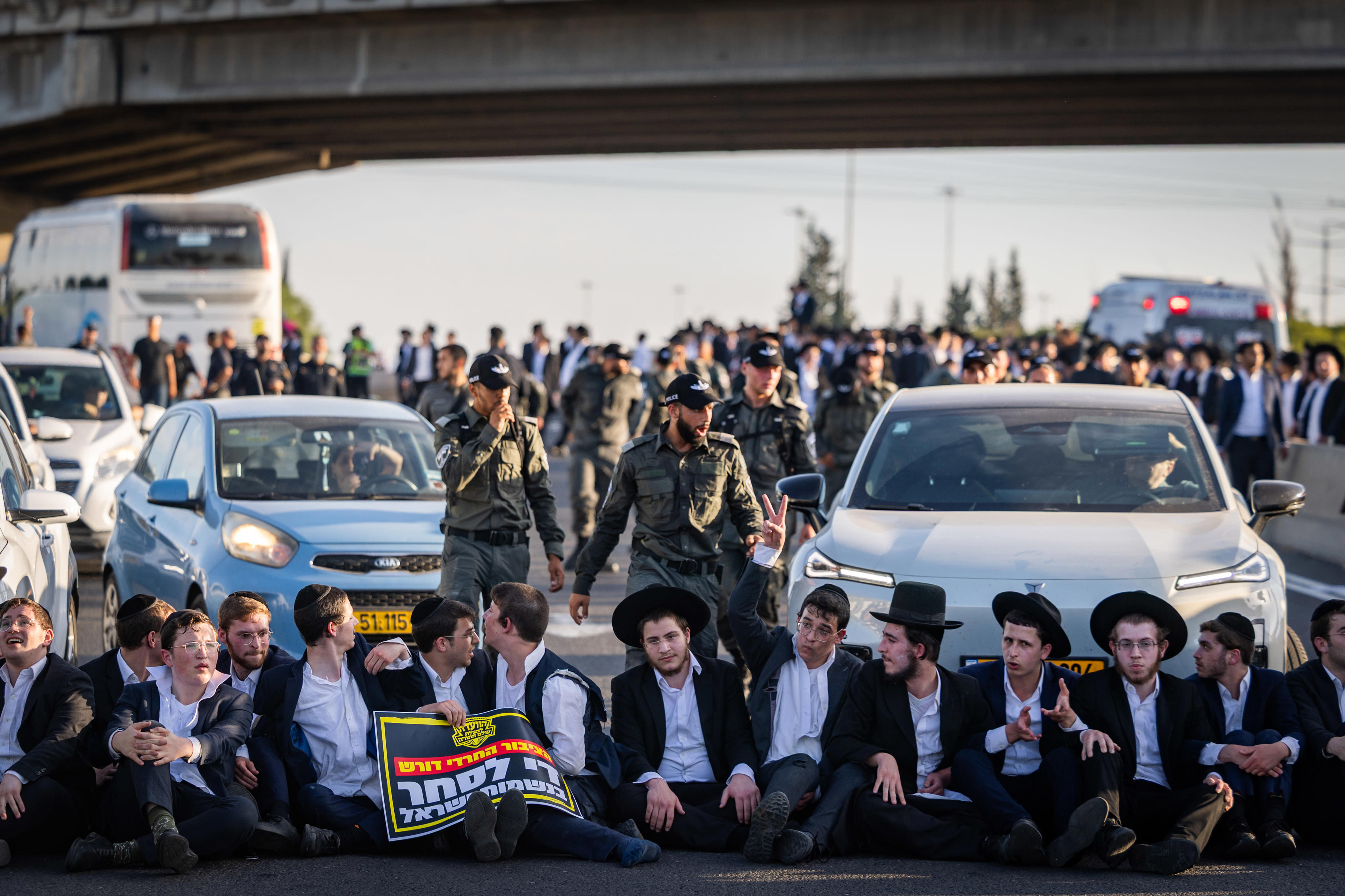 Haredi activists rush to Ashdod checkpoint after draft dodgers detained ...