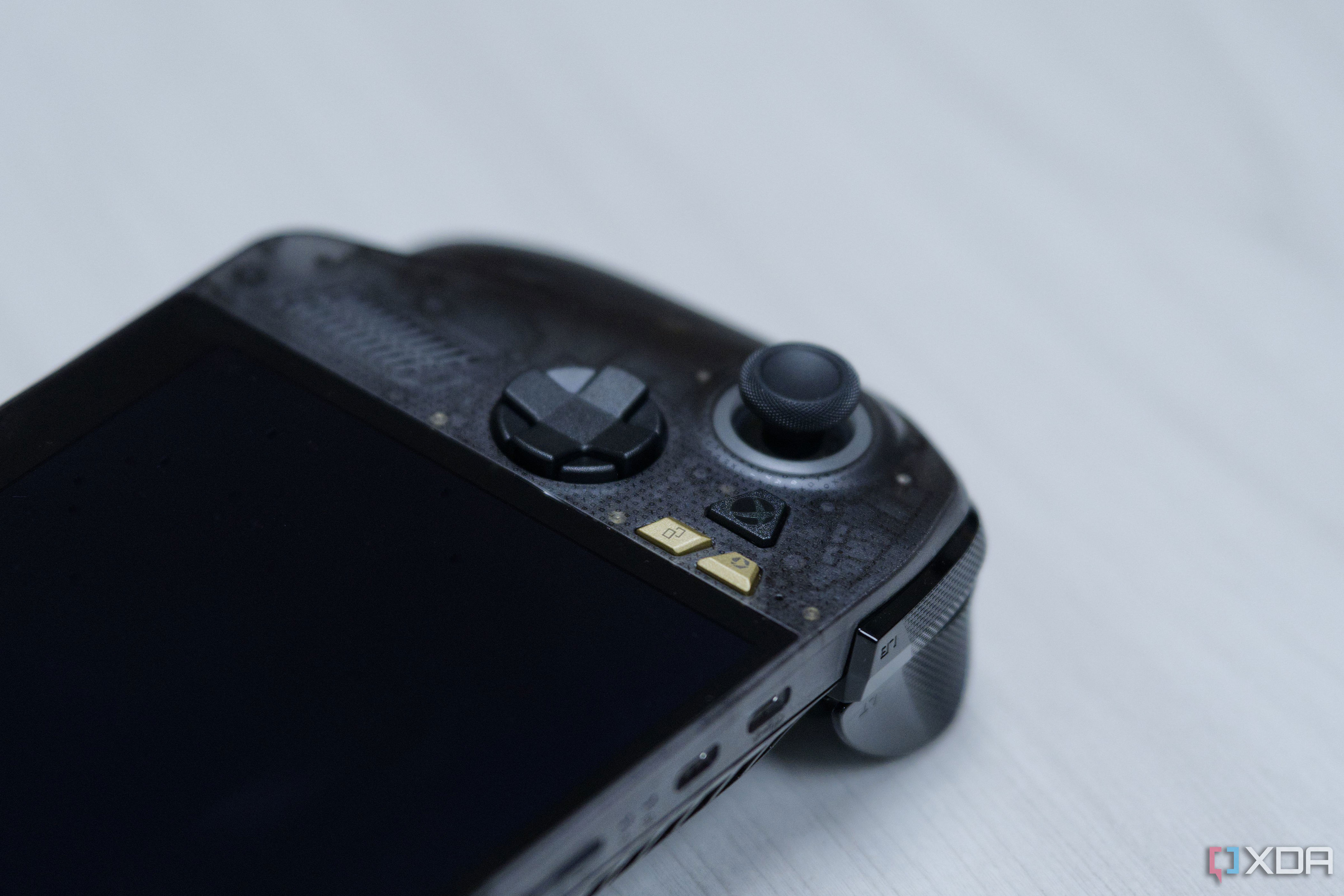 Gaming handhelds can't compete in ranked matches, and the joystick is ...