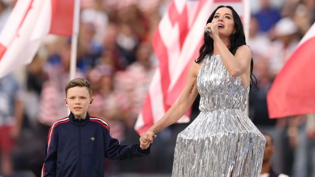 Who was the child singing with Katy Perry on the World Cup stage?