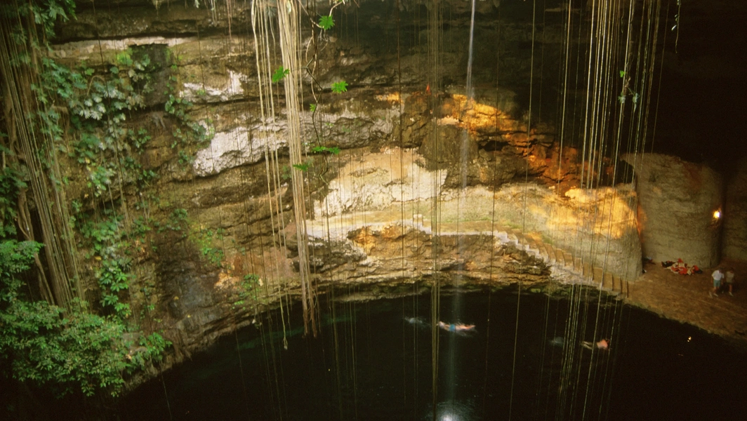 Ancient Maya canoe and sacred cenote discoveries