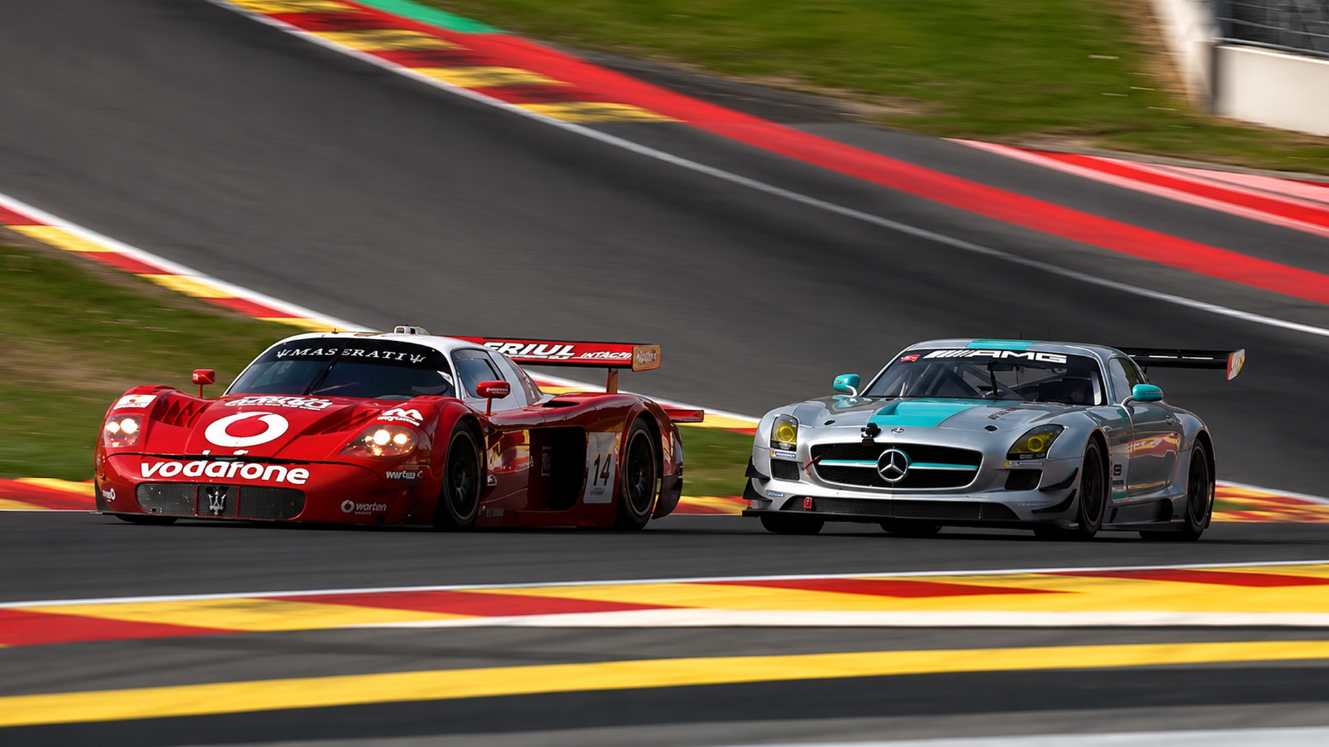 Rare Maserati MC12 battles Mercedes SLS AMG on race track