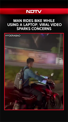 'Work from bike' in Hyderabad | Biker spotted using laptop while riding ...