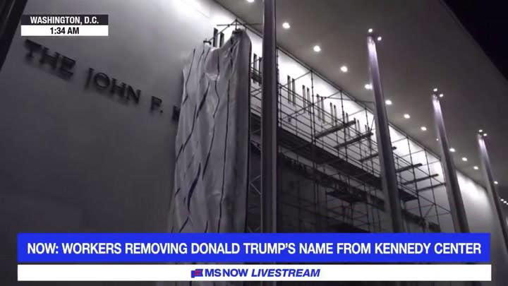 Workers cover front of Kennedy Center with tarp while removing Trump's name