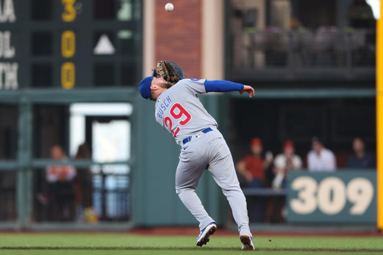 Michael Busch hits 3-run homer to back Javier Assad's strong start ...