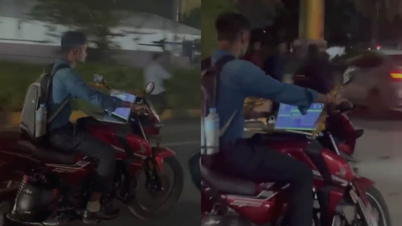 'Work from bike': Hyderabad man spotted with laptop on fuel tank of ...