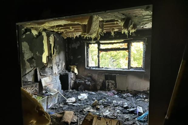 Home gutted by 'rapidly developing' fire as flames tear through room