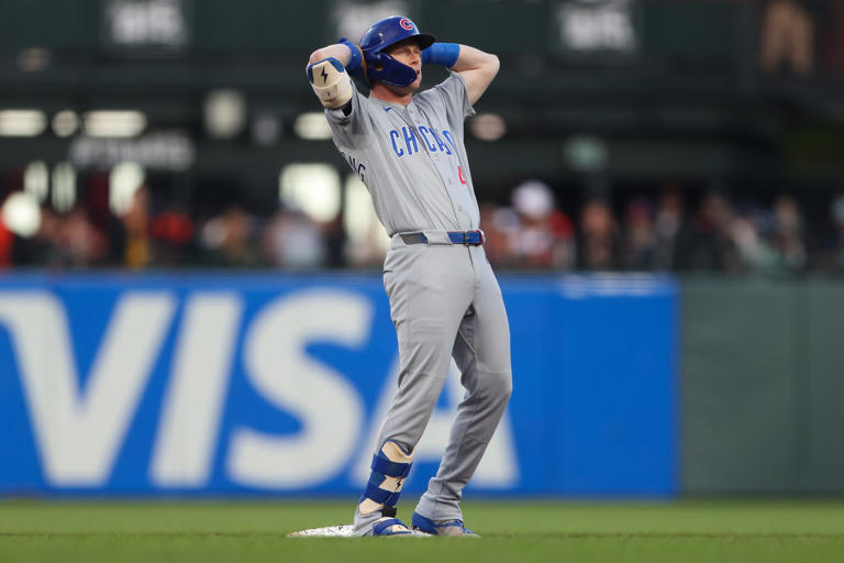 Michael Busch hits 3-run homer to back Javier Assad's strong start ...