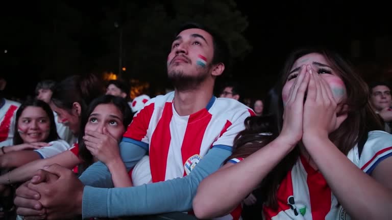 Paraguayan fans on edge after defeat in first World Cup match in 16 years